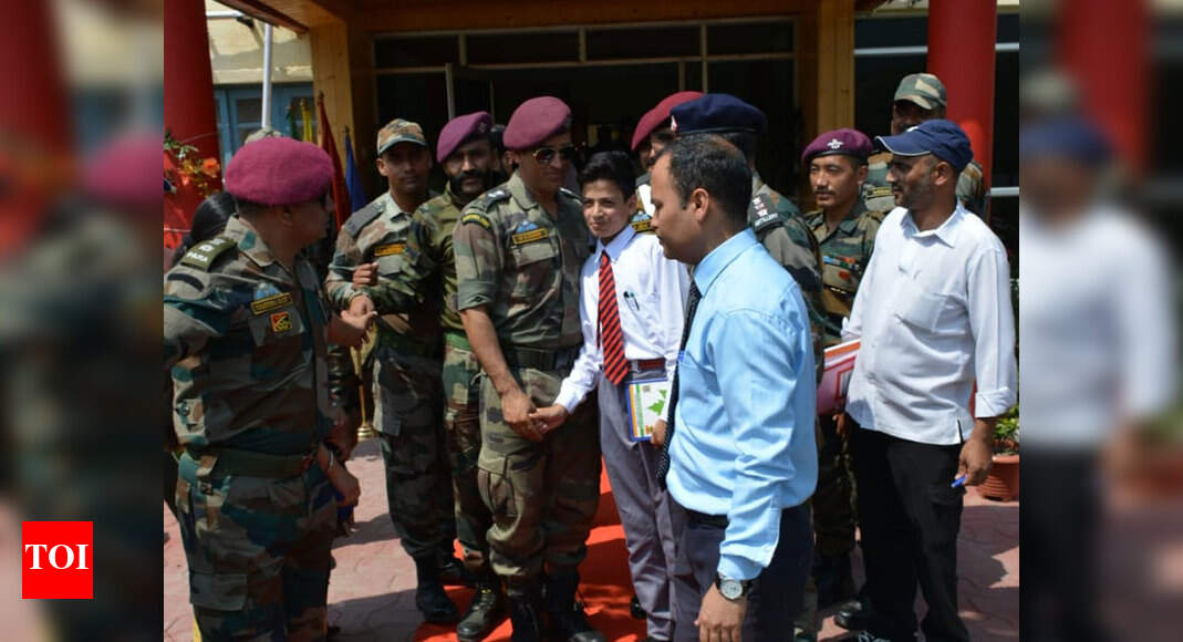 In J&K, Lt Col MS Dhoni learned about weaponry and shared insights of ...