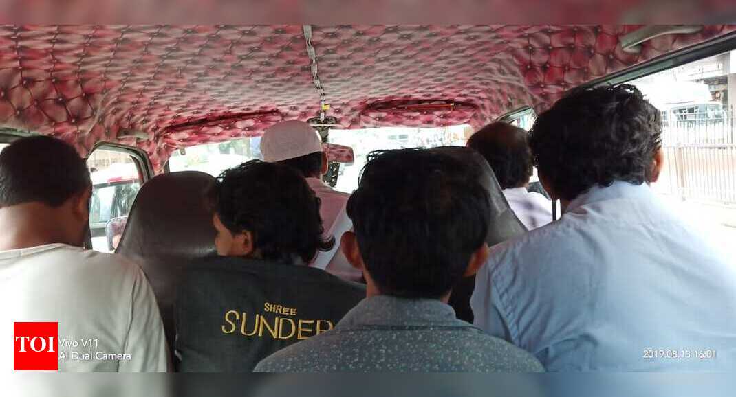 Overcrowding in share taxi. - Times of India