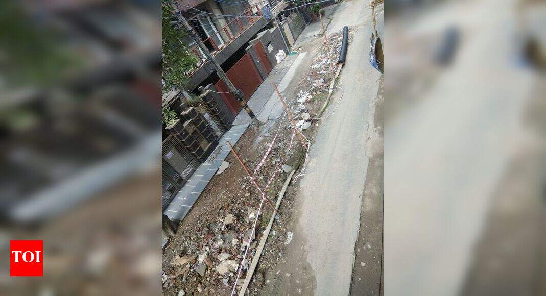Model Town road dug up for 2 months - Times of India