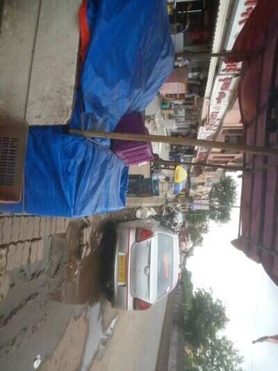 Footpath Stalled by the Stalls - Times of India