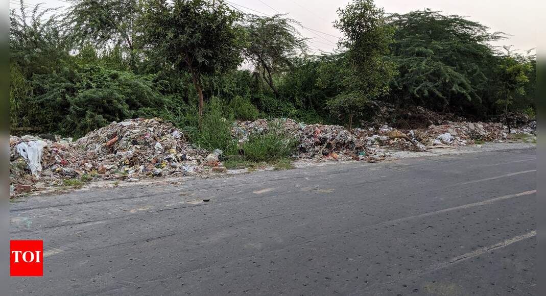 Trash hill in the making - Times of India