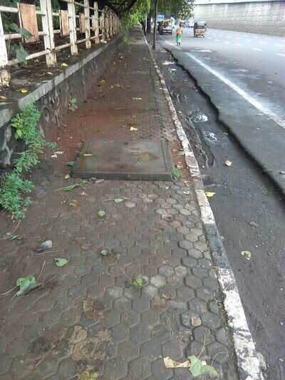 Damaged Footpath - Times of India