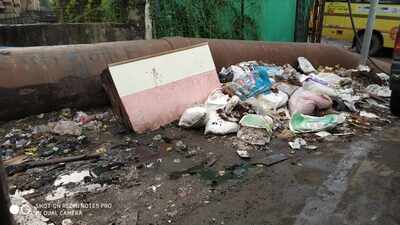 Garbage next to school - Times of India