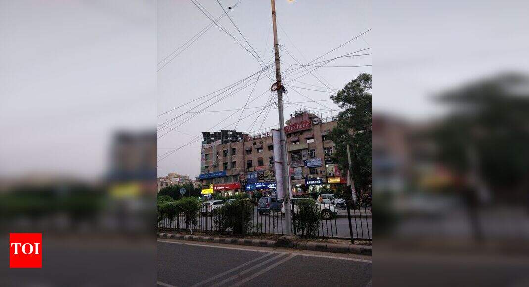 Obstruction for pedestrians and fire safety hazard - Times of India