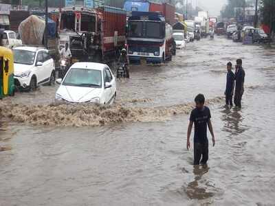 Rain slows down life in and around Indore | Indore News - Times of India