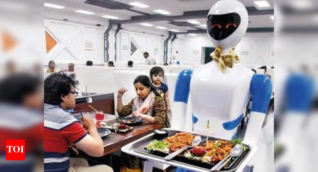 Grabbing a byte? Robot servers chip in | India News - The Times of India