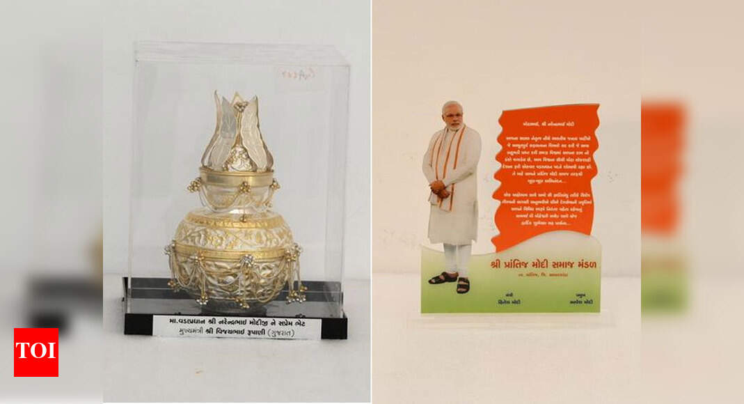 E-auction of PM Modi's gifts: Photo stand, silver Kalash fetch Rs 1 ...