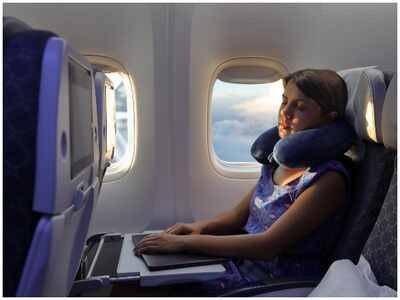 3 Asanas you can do while on the plane - Times of India