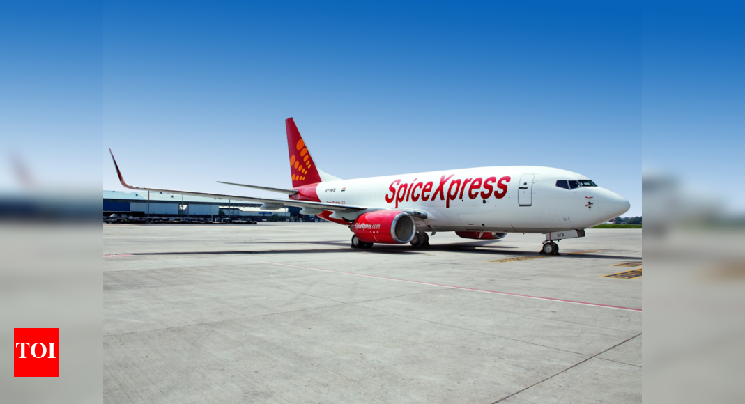 SpiceJet cargo arm inducts its first Boeing converted freighter - Times ...