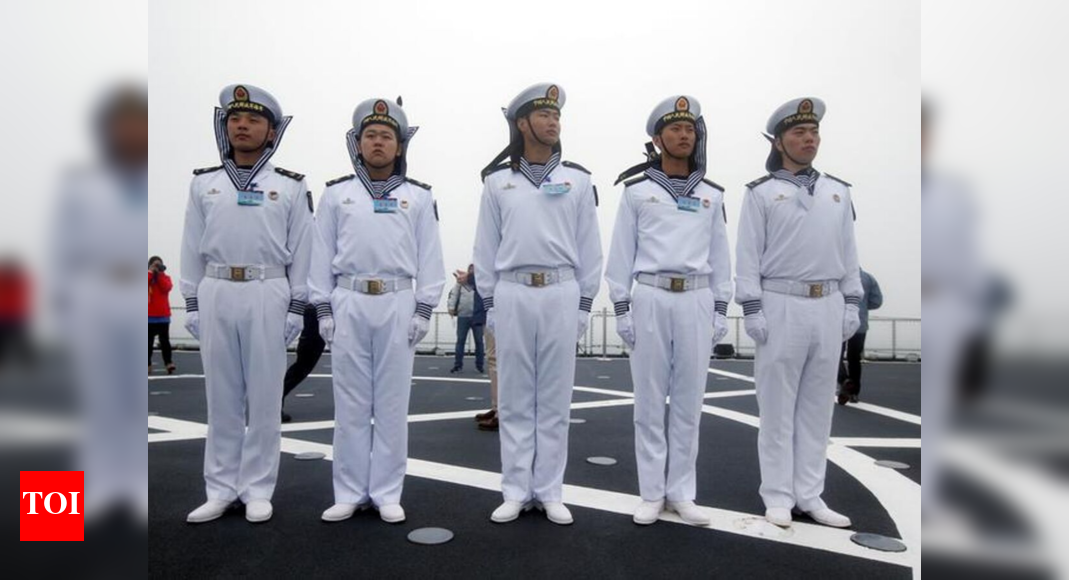 Chinese navy launches its first amphibious assault ship - Times of India