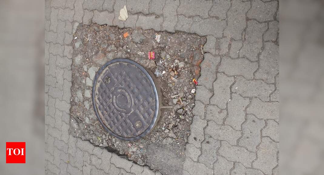 DANGEROUS MANHOLE - Times of India