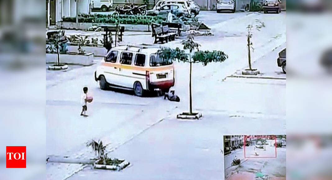Seven-year-old boy crushed under van, survives | Surat News - Times of ...