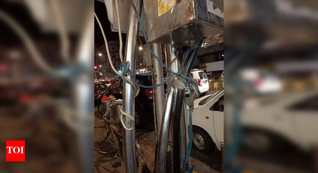 Open wires at BEST Bus stop - Times of India