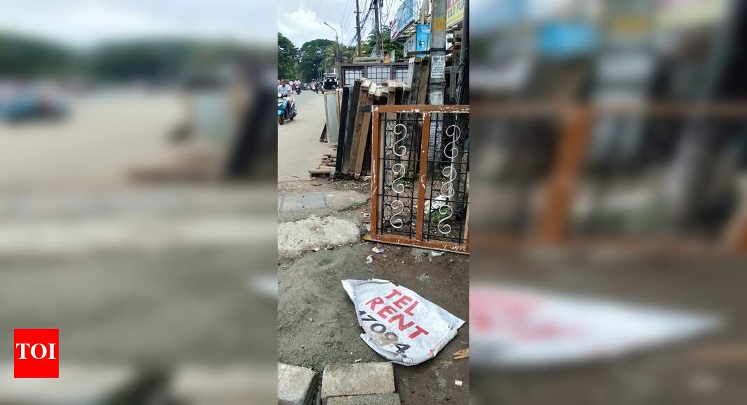 Busy foot path entirely being encroached - Times of India