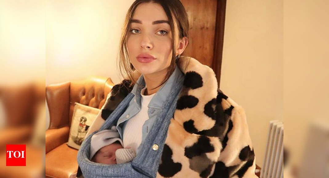 Photo: Amy Jackson flaunts her elegant style as she poses with her son ...