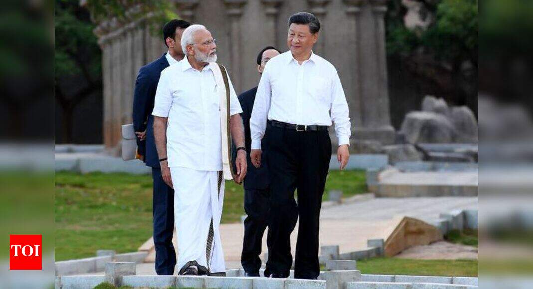 In white shirt & veshti, Modi dressed to heal | India News - Times of India