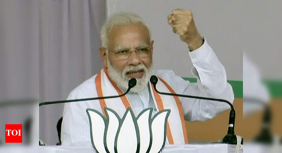PM Modi dares opposition to declare bringing back Article 370 in ...