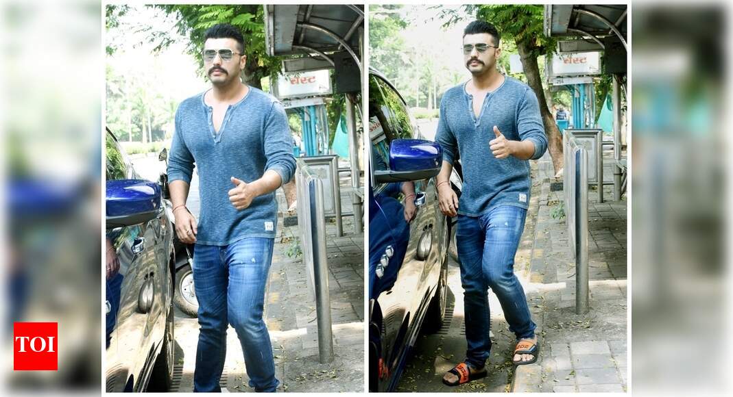 Pics: Arjun Kapoor gives shutterbugs a thumbs-up as he gets papped in ...