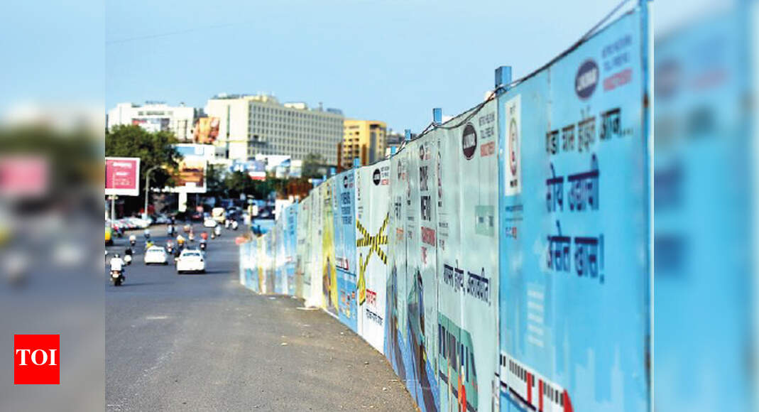 MahaMetro installs barricades along road divider to prevent accidents ...