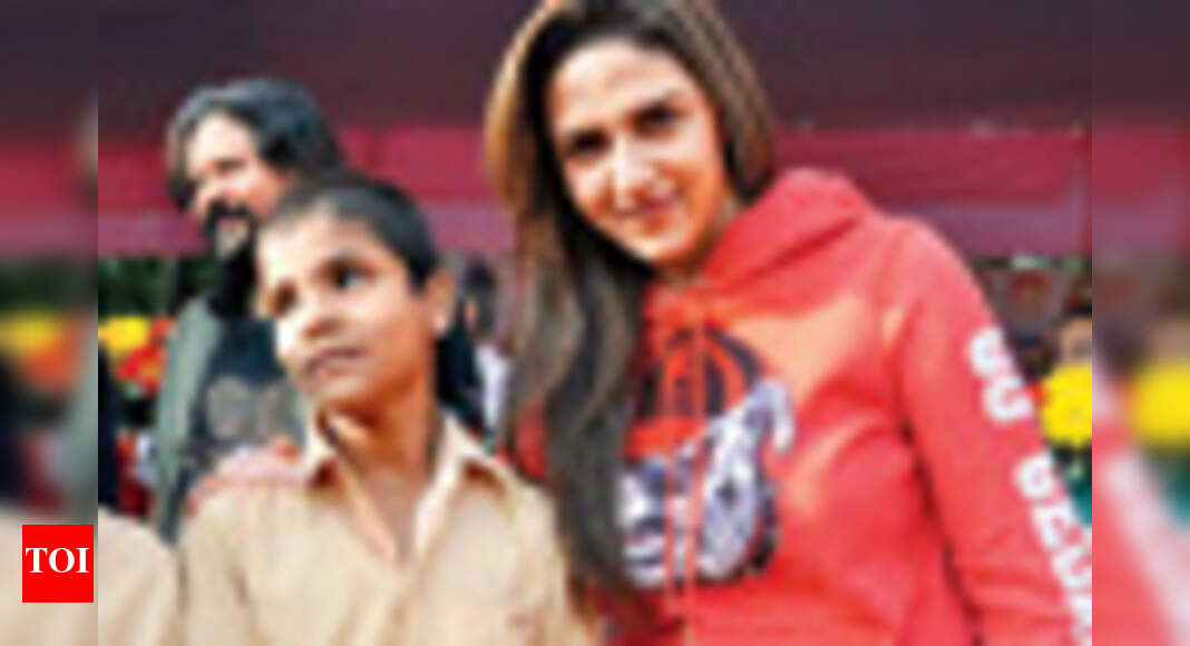 Esha visits her alma mater | Events Movie News - Times of India