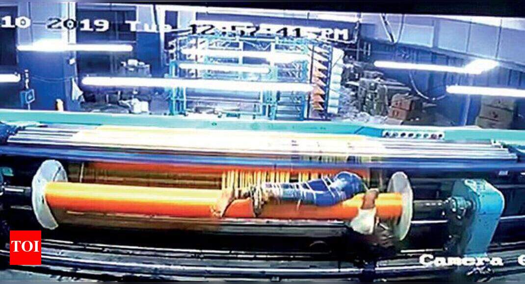 Miraculous escape for worker entangled in thread warping machine ...