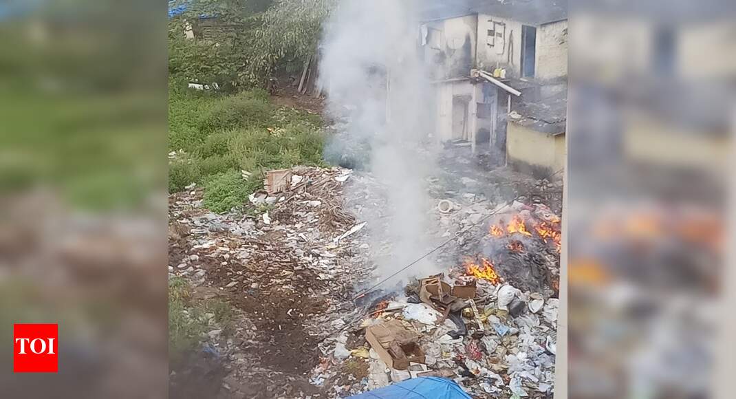 Burning of trash in residential area - Times of India