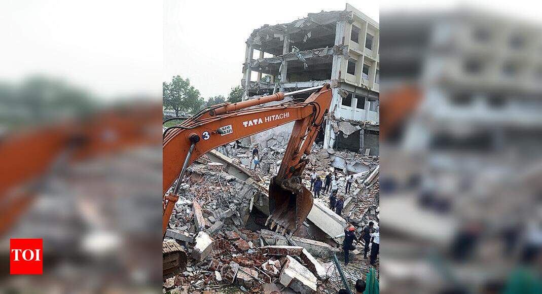 Rescue ops end at razed building | Vadodara News - Times of India