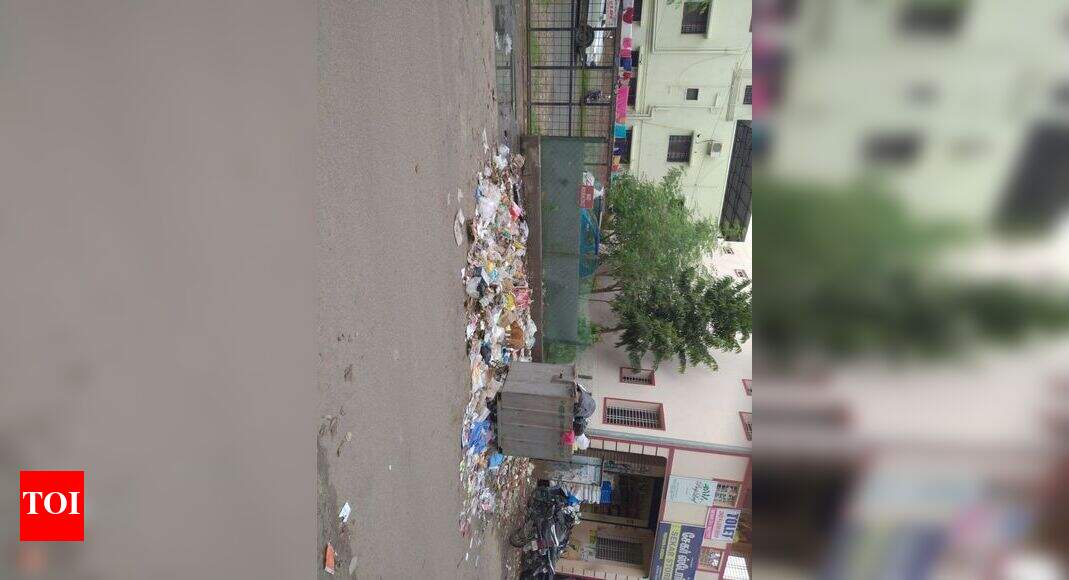 unremoved garbages months together - Times of India