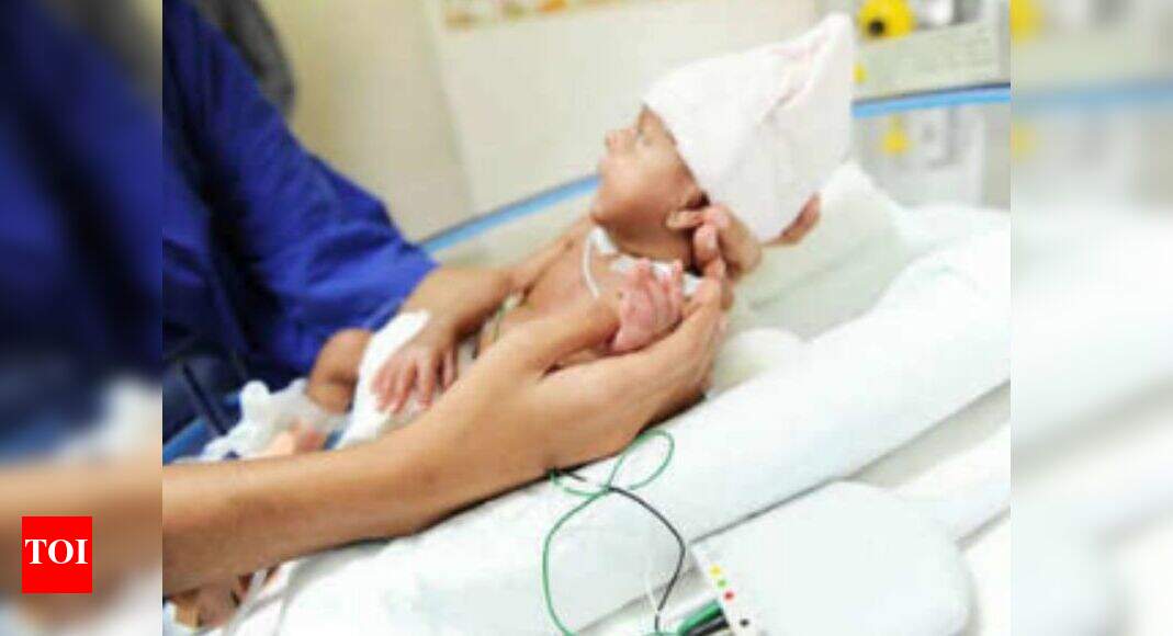 Premature Indian-origin baby saved by machine lungs in UK - Times of India