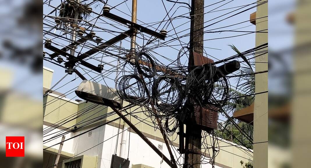 Electric post or jungle of electric wires? - Times of India