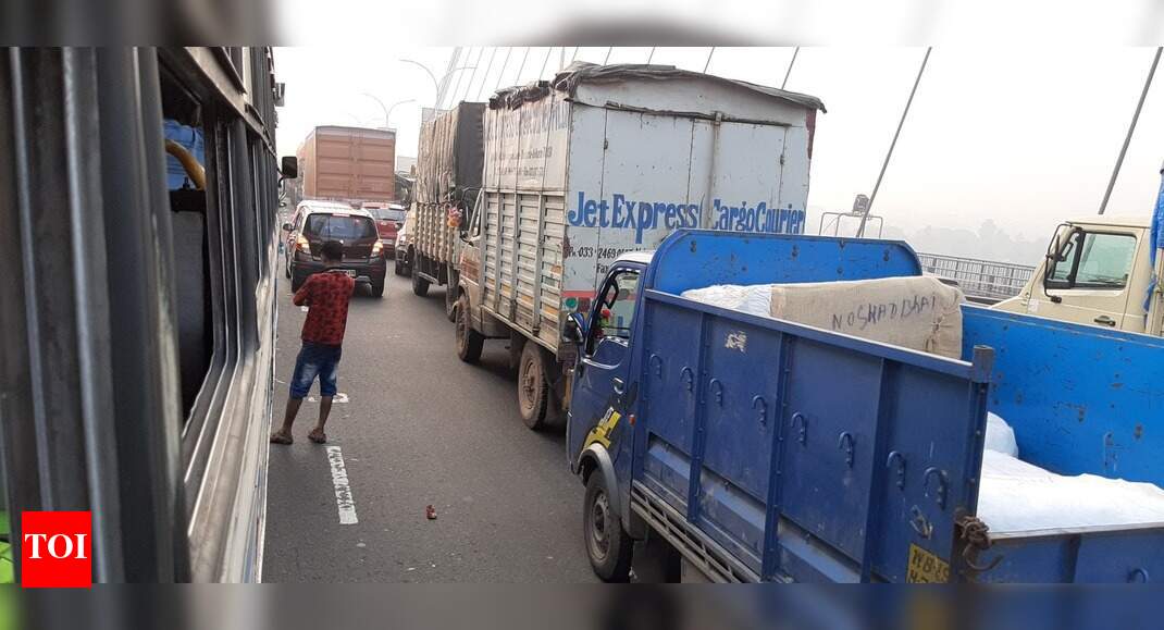 Roadblock leaves thousands stranded daily. - Times of India