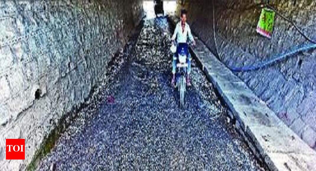 Service road near Pune-Bengaluru highway and underpass opposite Bitwise ...