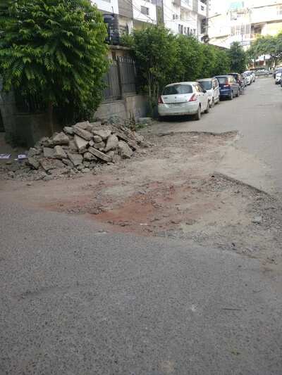 Road scraped, debris unattended - Times of India