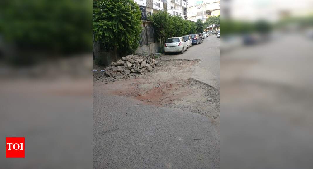 Road scraped, debris unattended - Times of India