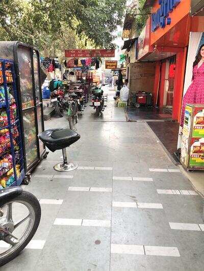 Footpath for parking, main road for pedestrians - Times of India