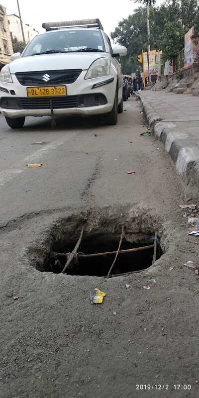 Caved-in main road - Times of India