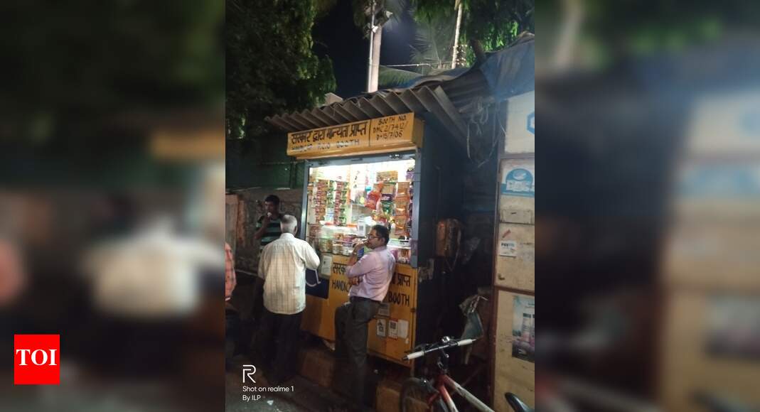 licensed PCO booth selling goods - Times of India