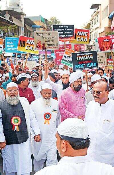 Pune: Black ribbon protest as 12,000 march to voice anger against CAA ...