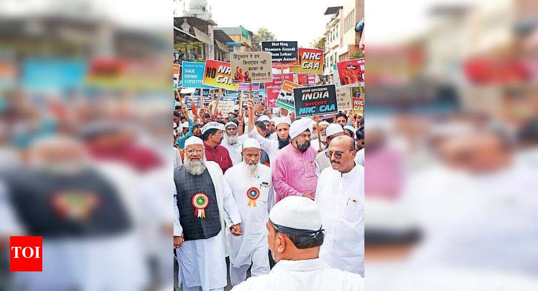 Pune: Black ribbon protest as 12,000 march to voice anger against CAA ...