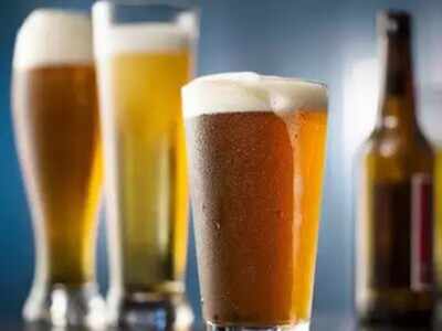 Key to making perfect head of beer discovered - Times of India