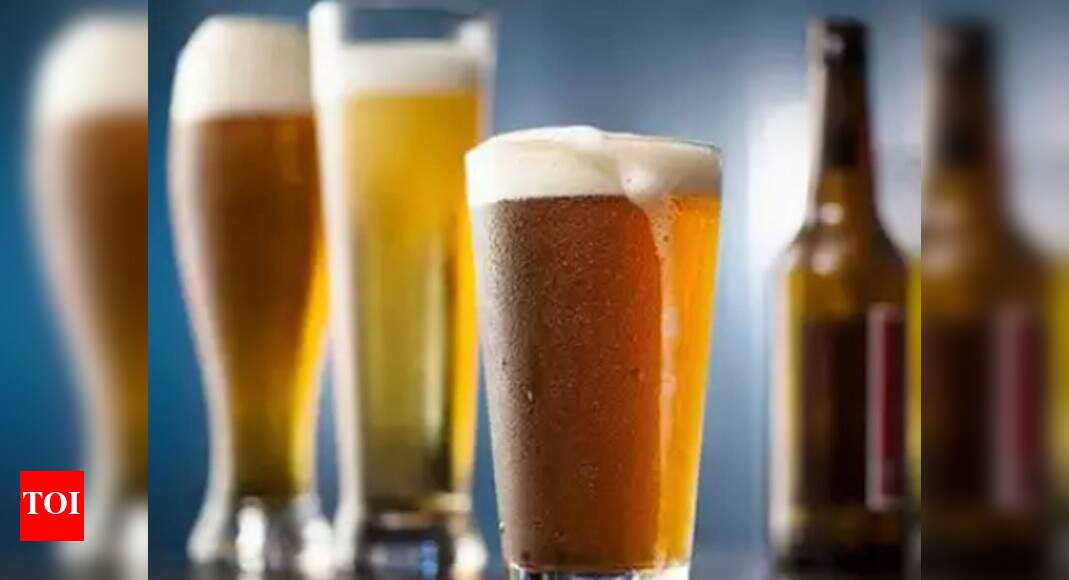Key to making perfect head of beer discovered - Times of India