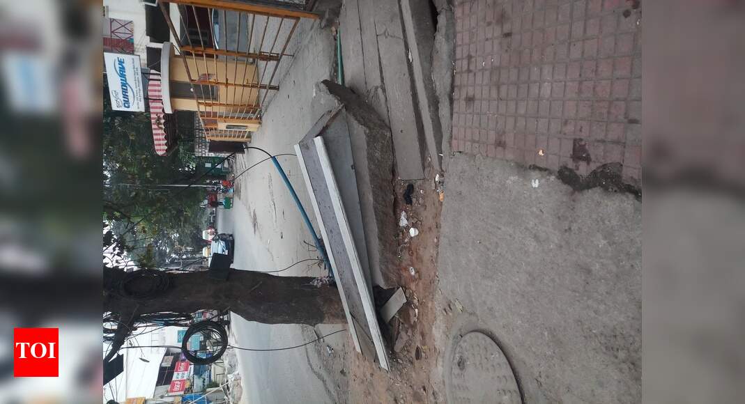 Big Boulder Blocking Footpath - Times of India