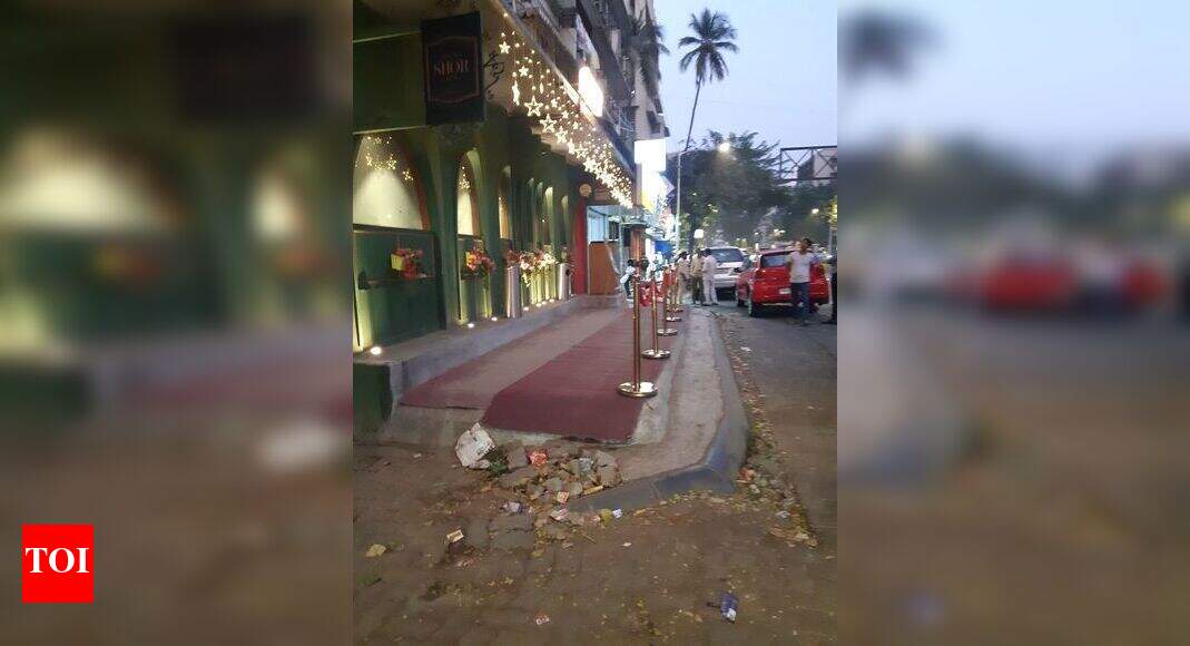 footpath encroachment - Times of India