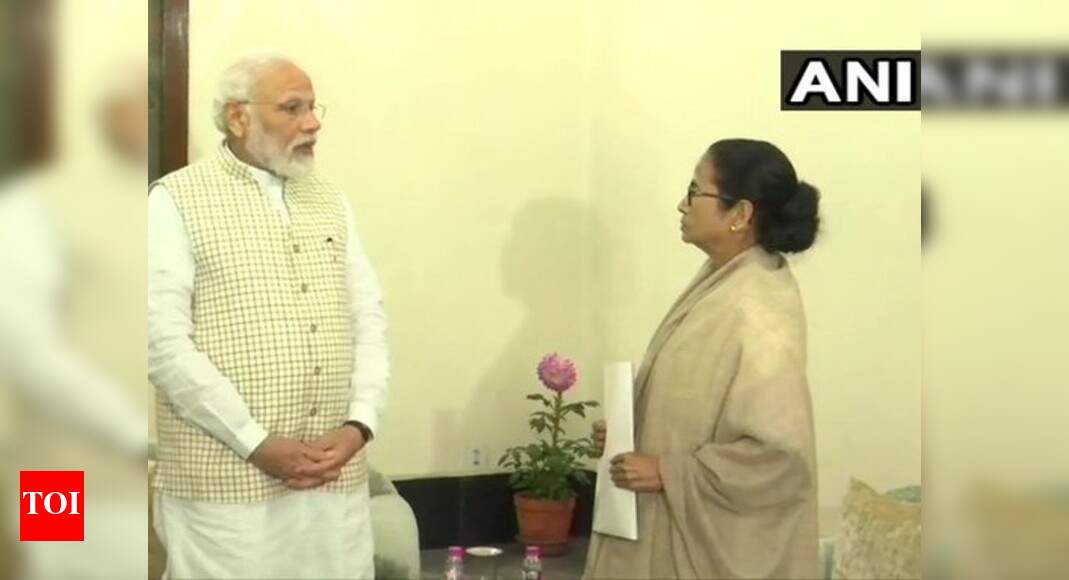 PM Modi and Mamata Banerjee meet at Raj Bhawan | India News - Times of ...