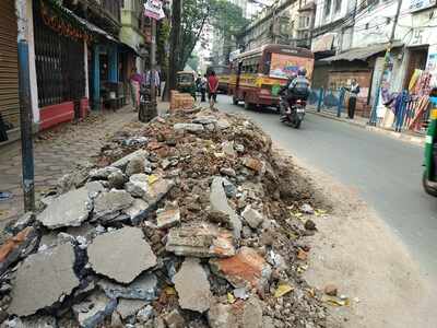 Damaged sidewalk, Beadon Street - Times of India