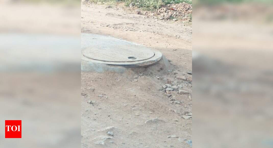 underground drainage manhole - Times of India