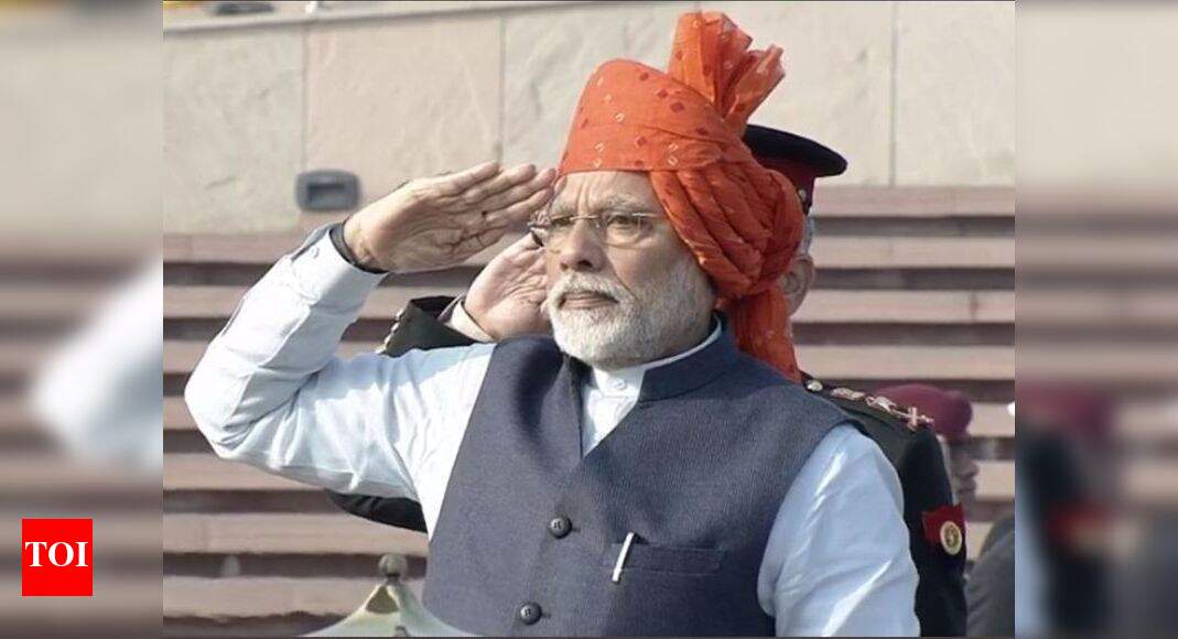 PM Modi continues 'safa' tradition, sports saffron 'bandhej' turban on ...