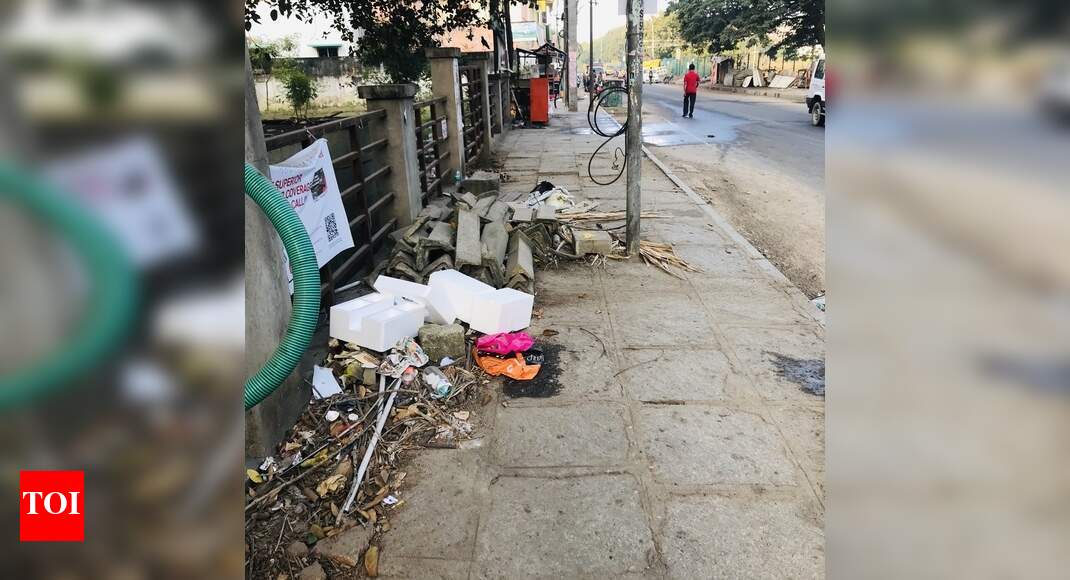 Neglected foot path - Times of India
