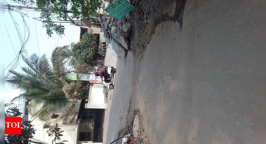 obstruction on the road - Times of India