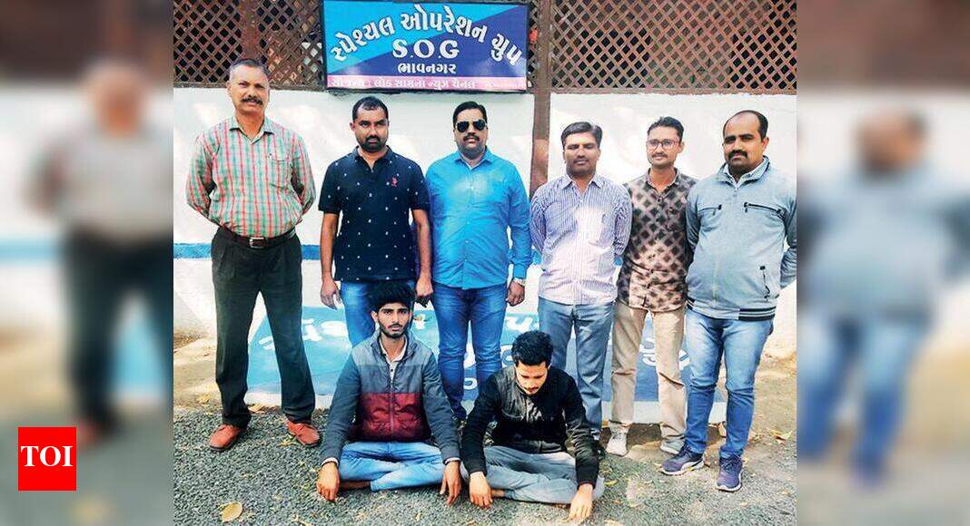 Two arrested for vehicle loot, extortion | Rajkot News - Times of India